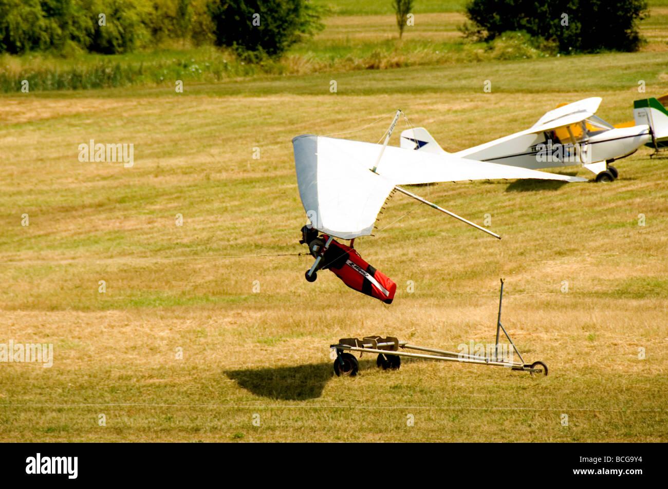 Hang glider taking off at an airshow in France Stock Photo - Alamy