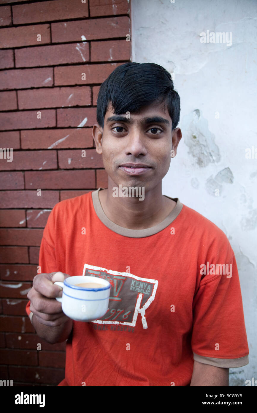 Young man drinking tea Stock Photo - Alamy Young man drinking tea Stock Photo - Alamy