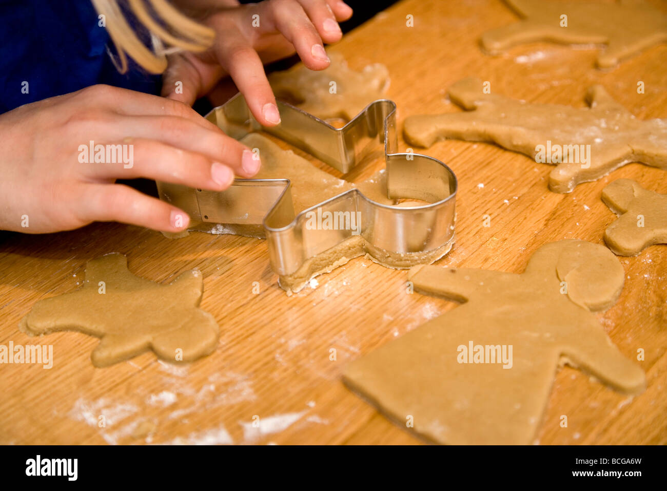 A Child Making Gingerbread People Stock Photo - Alamy