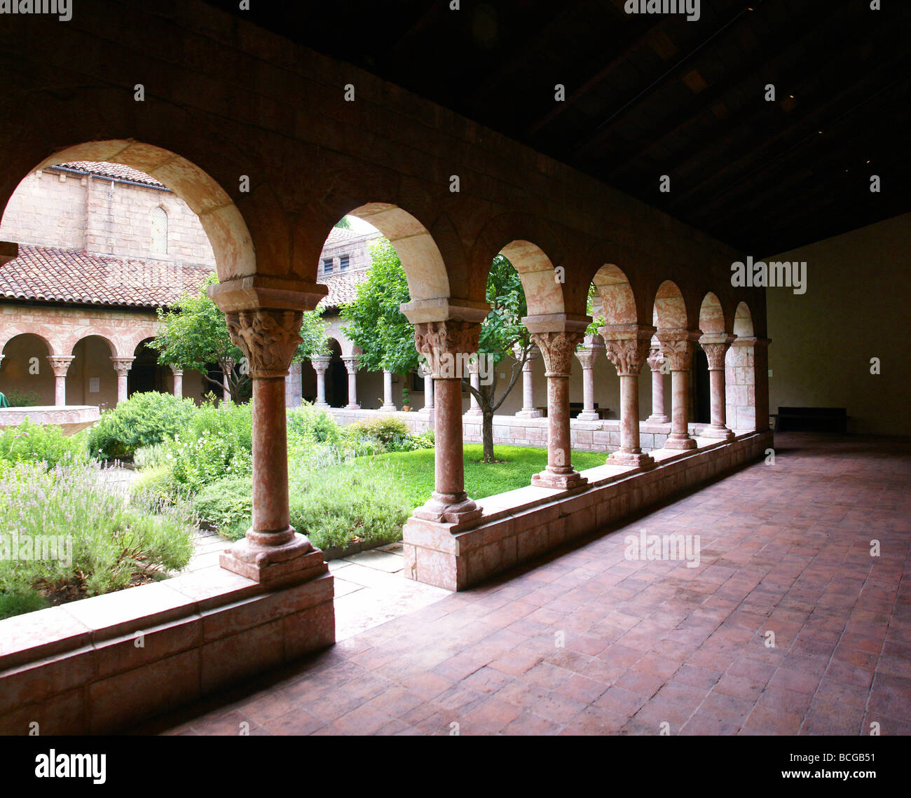 Arches and carved columns medieval Cloisters New York City Stock Photo ...