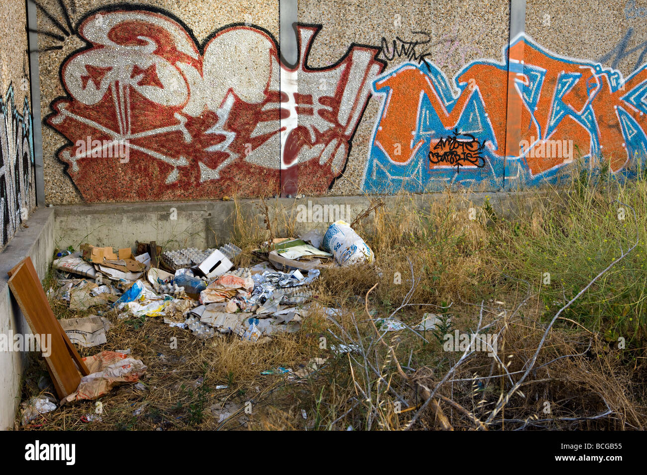 Garbage corner with graffity Stock Photo - Alamy