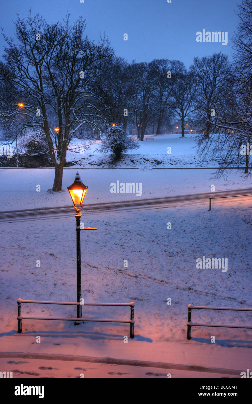 Winter evening scene with lamp-post Stock Photo - Alamy