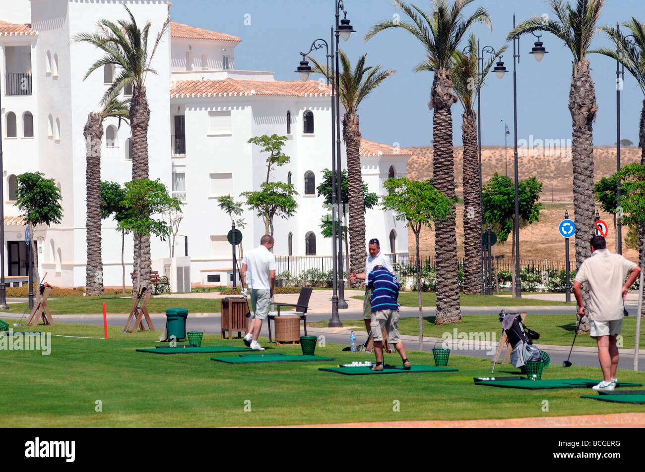 Golfers on the practice range at a Hacienda Riquelme Spanish Golf ...