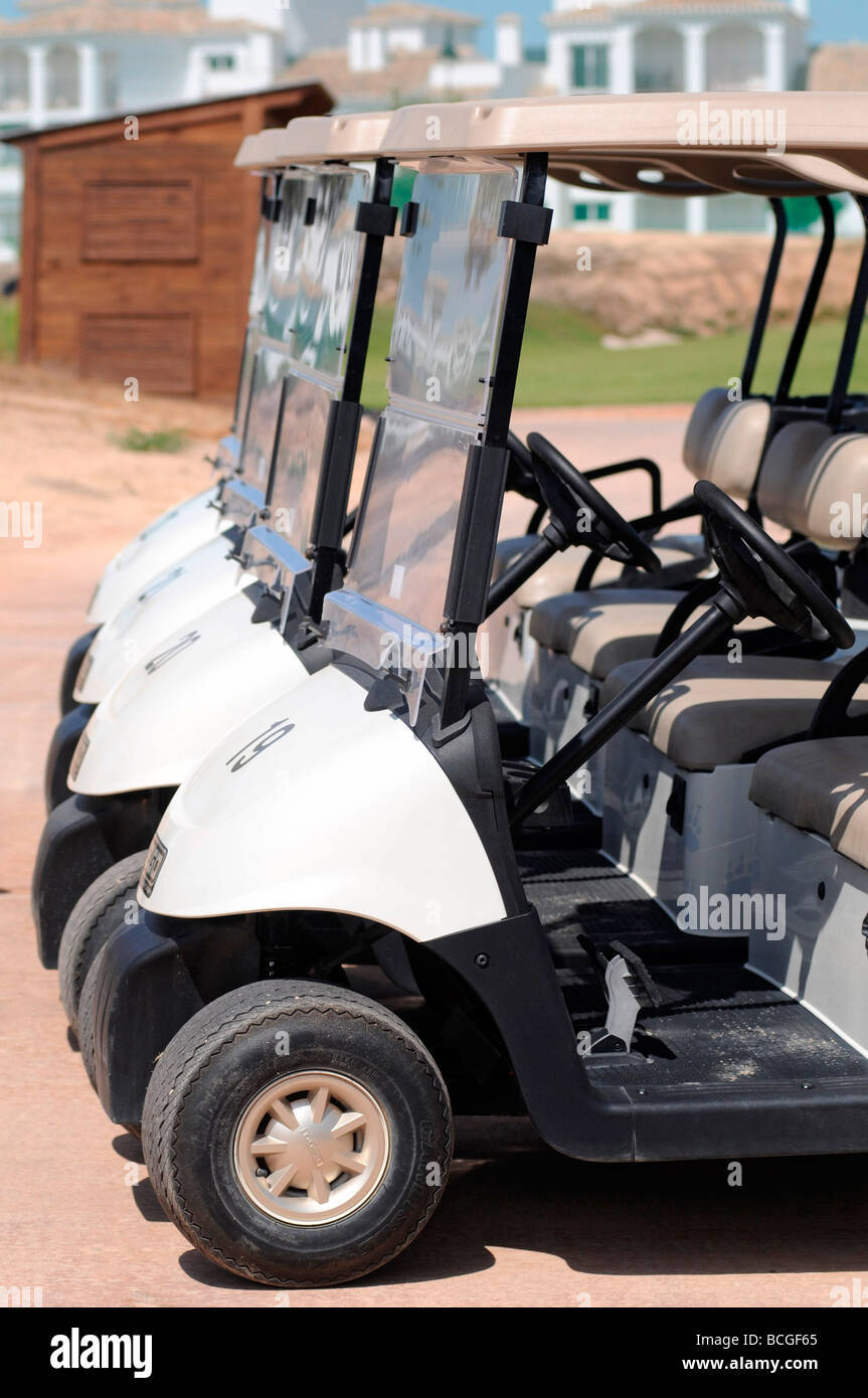 Row of electric powered golfing buggy's lined up at a Golf Resort in ...