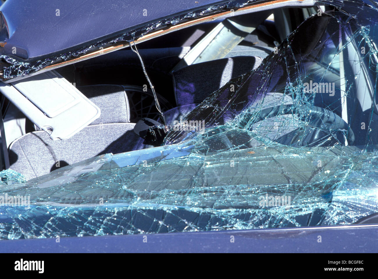Smashed auto windshield Stock Photo - Alamy