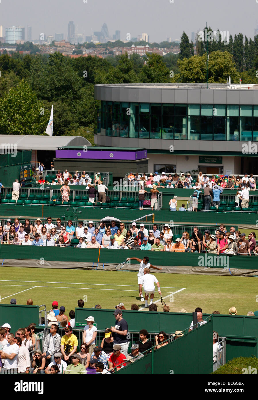 View of the Wimbledon tennis courts with the London skyline in the ...