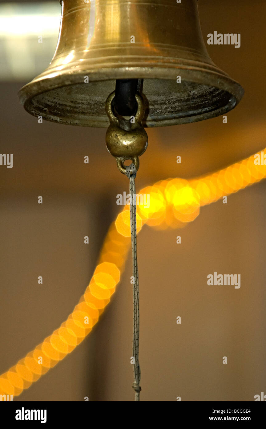 a bell at a Hindu temple which is rung at various parts during Hindu ...
