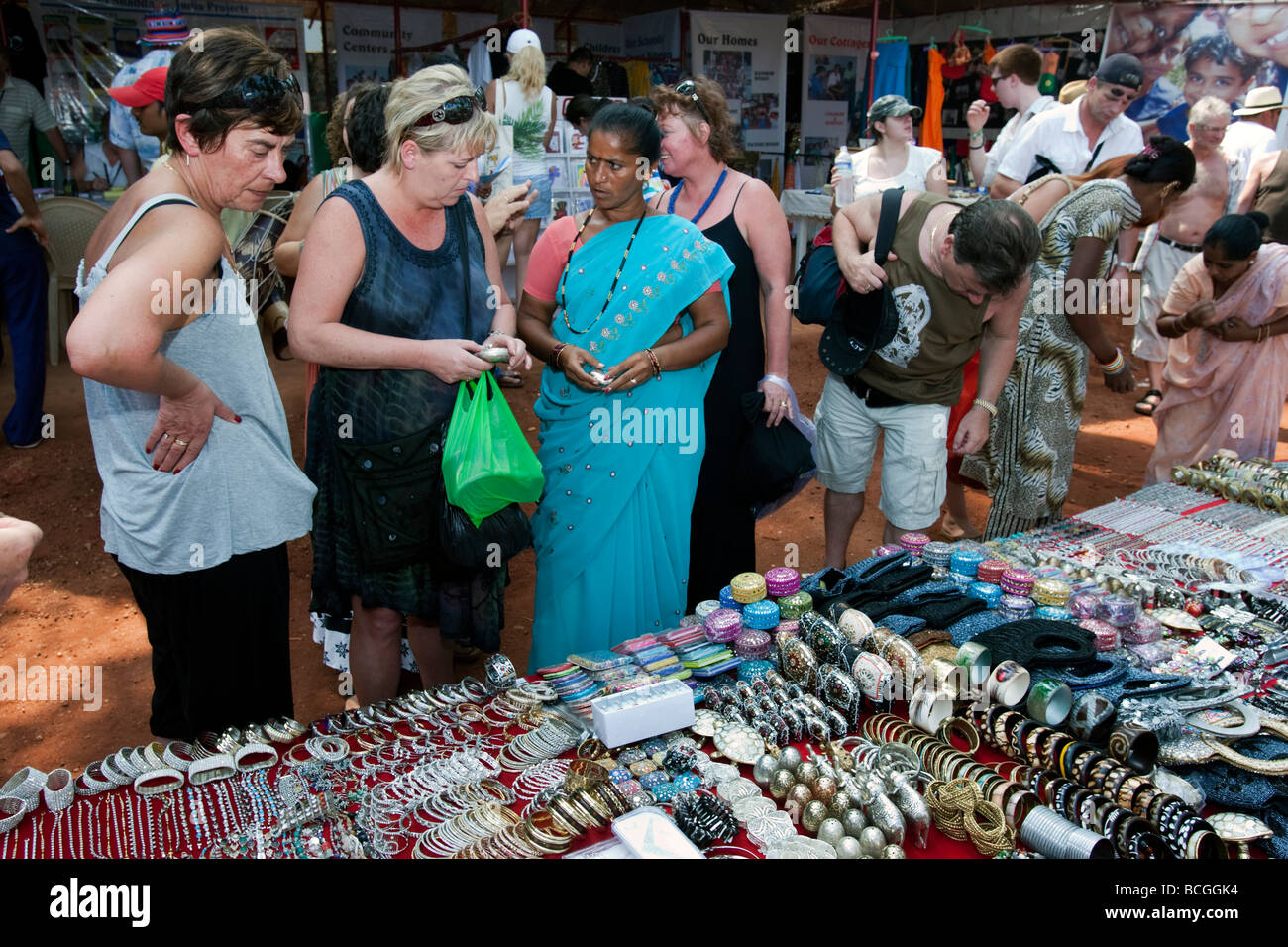 Anjuna weekly hippy flea market Goa India Stock Photo - Alamy