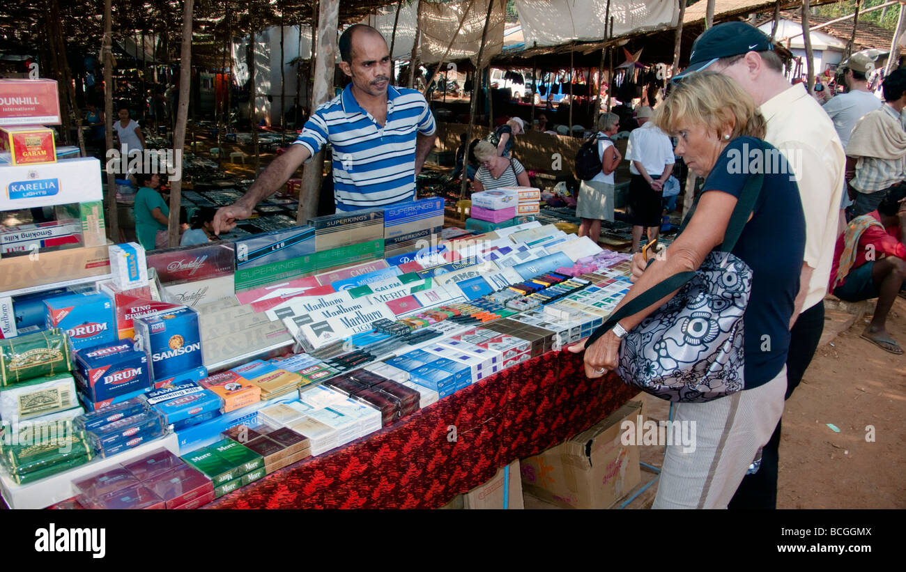 Anjuna weekly hippy flea market Goa India Stock Photo - Alamy