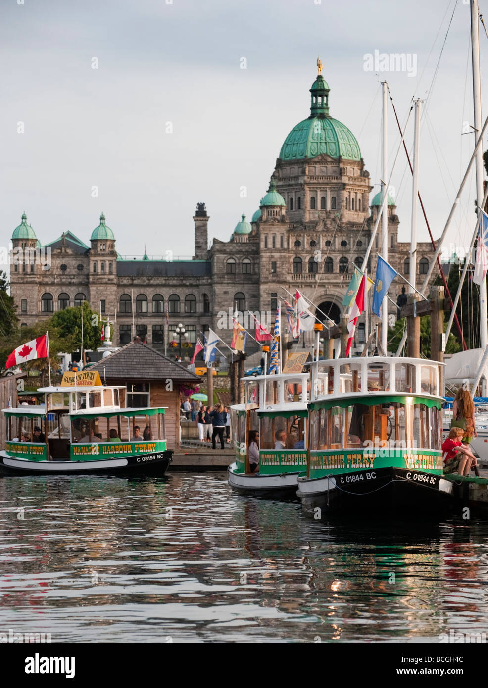 Victoria, British Columbia. Small ferry boats shuttle tourists around ...