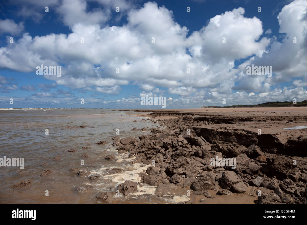 Formby Point silt layers Stock Photo - Alamy
