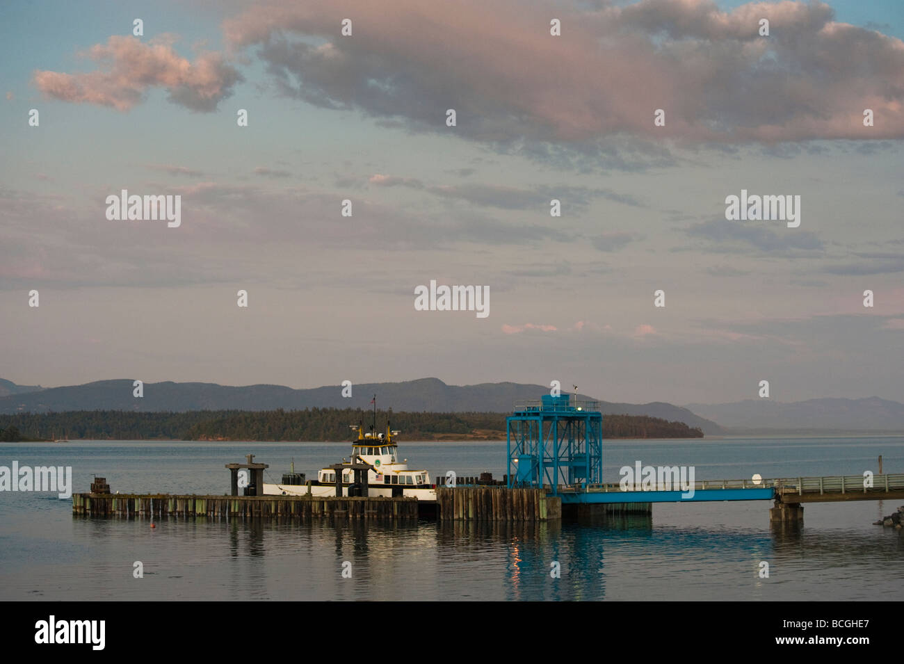 As the sun sets on the Pacific Northwest, the small 20 car Lummi Island ...
