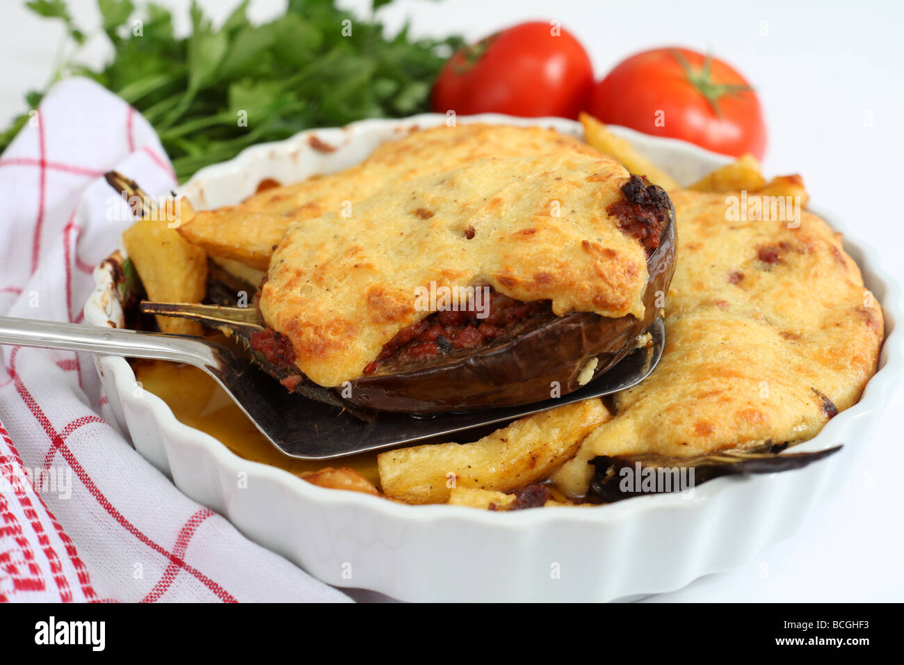 Traditional Greek papoutsakia eggplant stuffed with meat tomato and ...