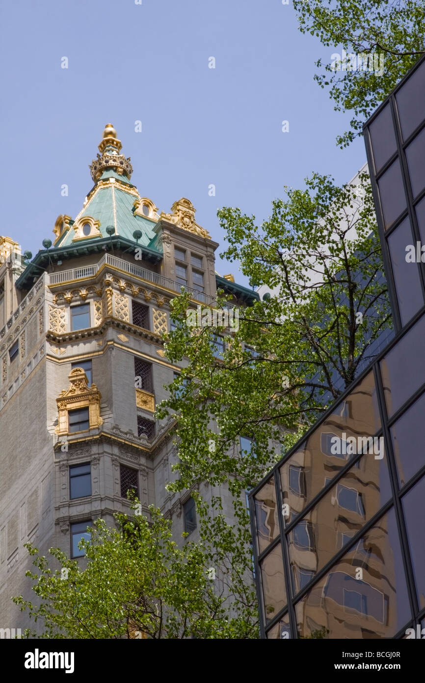 old building reflected in the windows of a modern building, New York ...