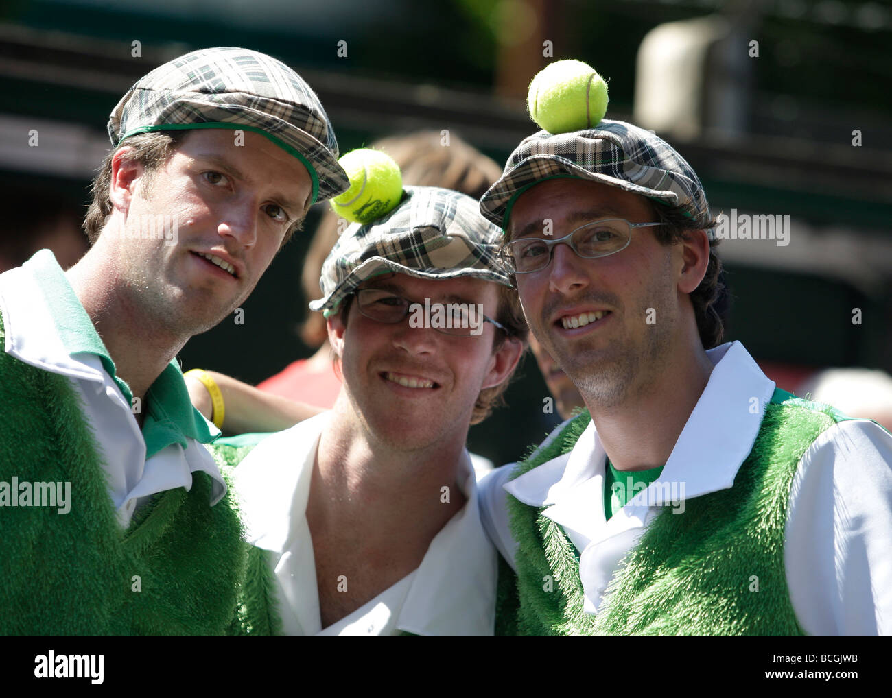 Three fans in funny costumes at the Wimbledon Championships Stock Photo ...