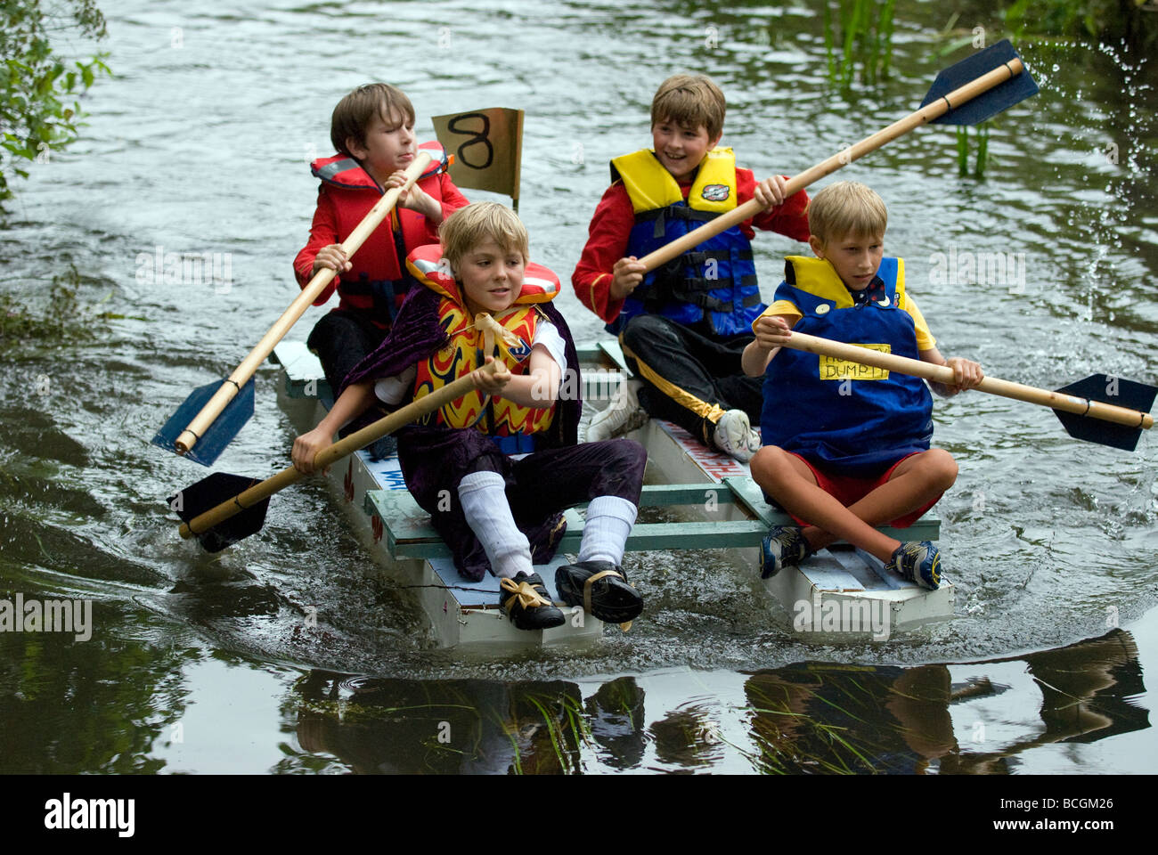 Kids taking part in a Raft Race, Tilford, Farnham, Surrey, UK Stock ...