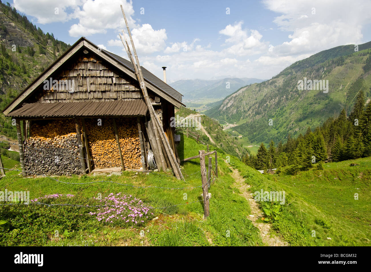 Traditional Austrian wood storage hut Stock Photo - Alamy