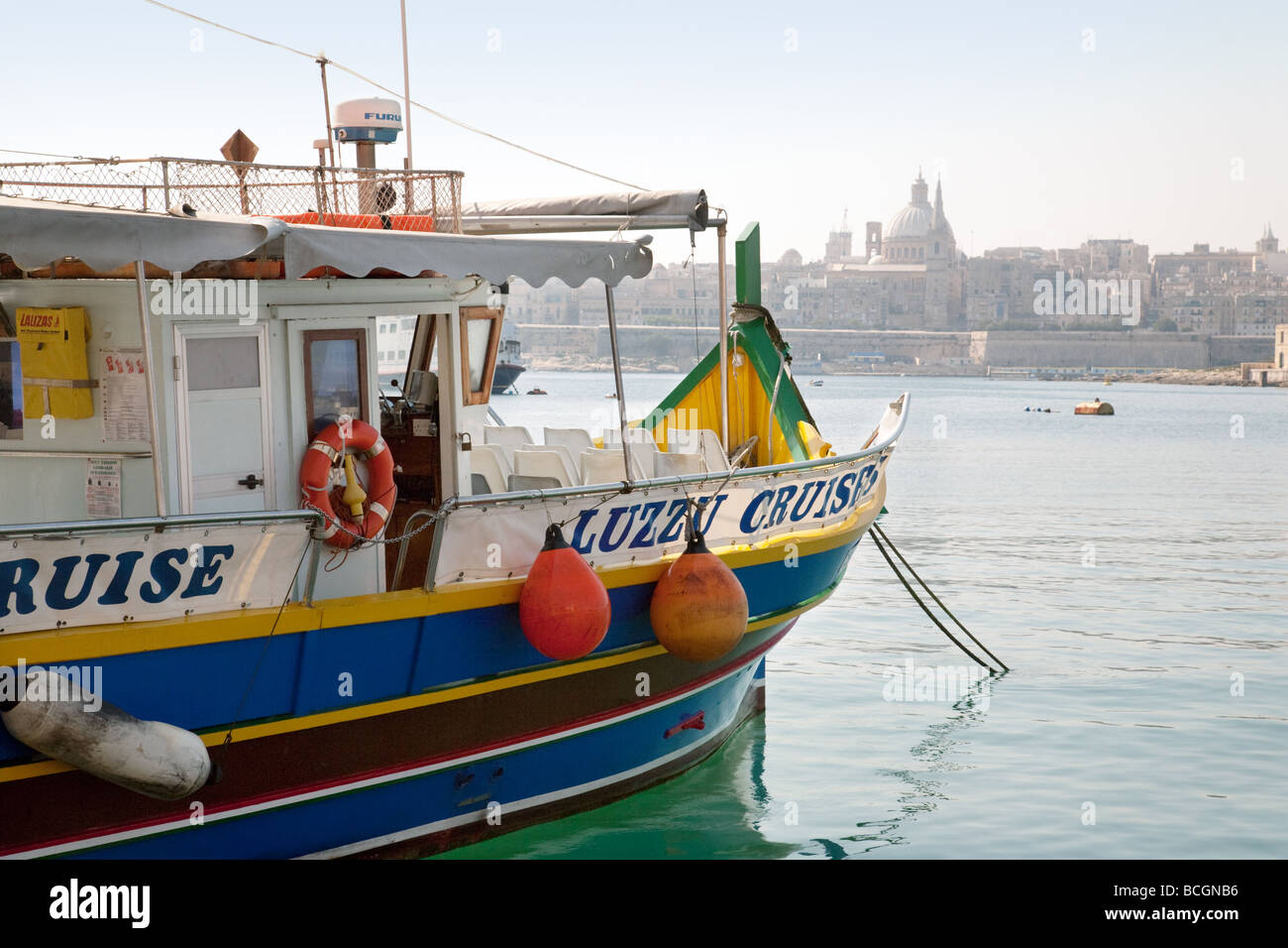 A luzzu (Traditional Maltese boat) awaits passengers for a cruise round ...