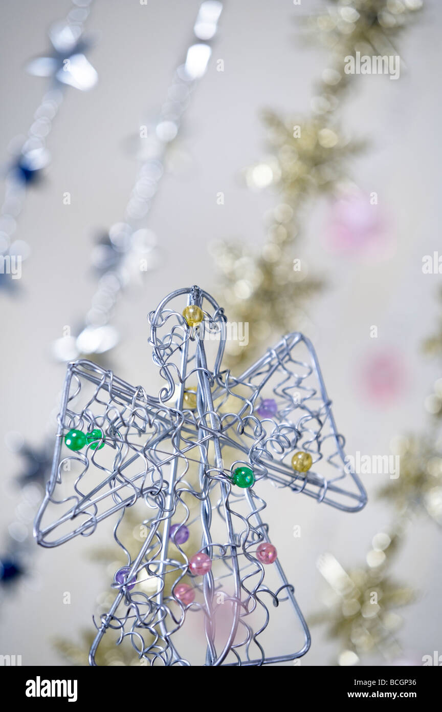A decoration for Christmas of an angel made with wire Stock Photo - Alamy