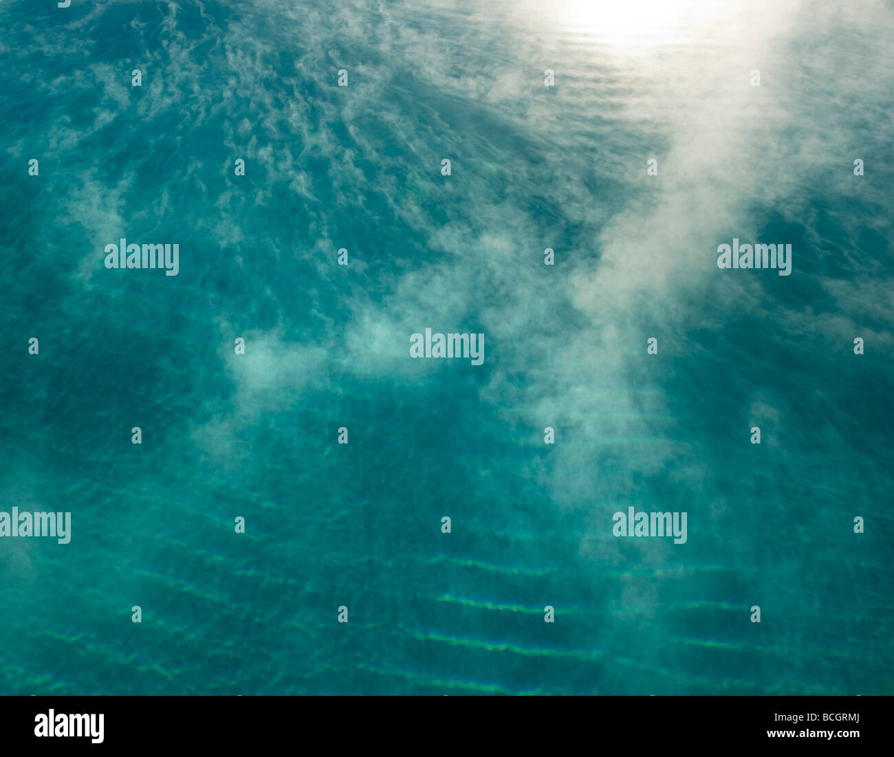 steam rising from warm water Stock Photo - Alamy