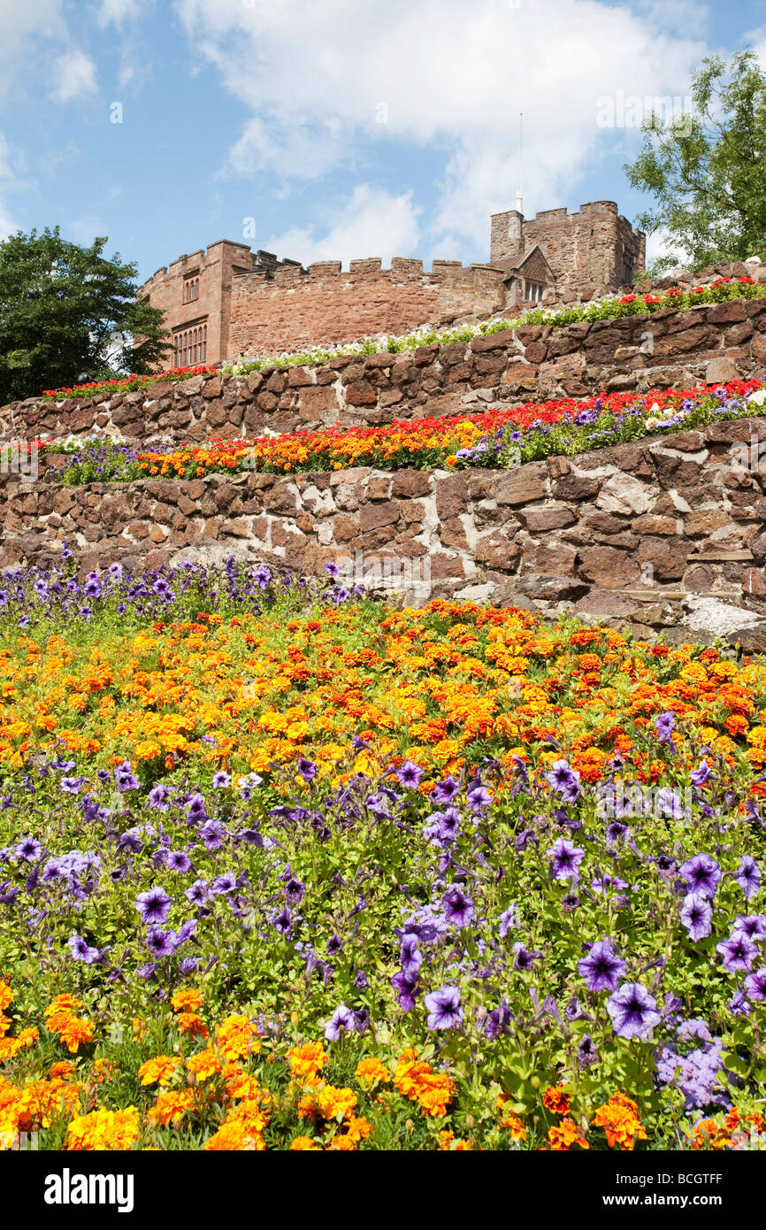 castle overlooking summer flower display in a park Stock Photo - Alamy