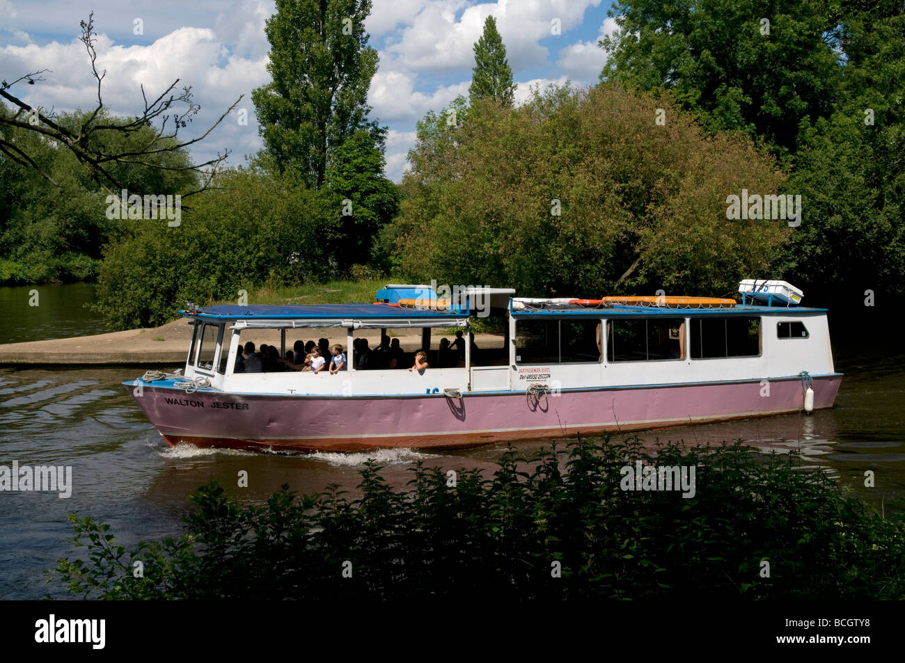 Tourist boat the "Walton Jester" on a sightseeing tour on river Thames ...