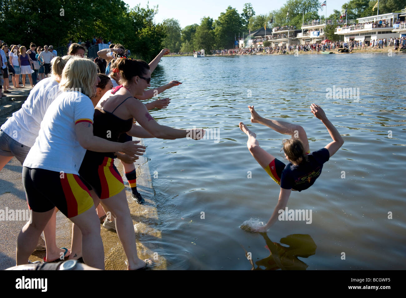 A crew member hits the water in celebration on the Saturday and last ...