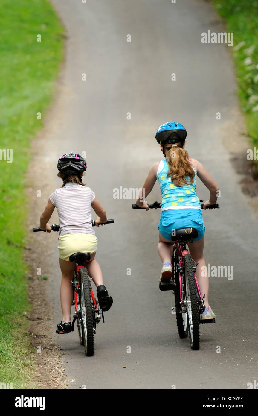 Children cycling along a country lane England UK Stock Photo - Alamy