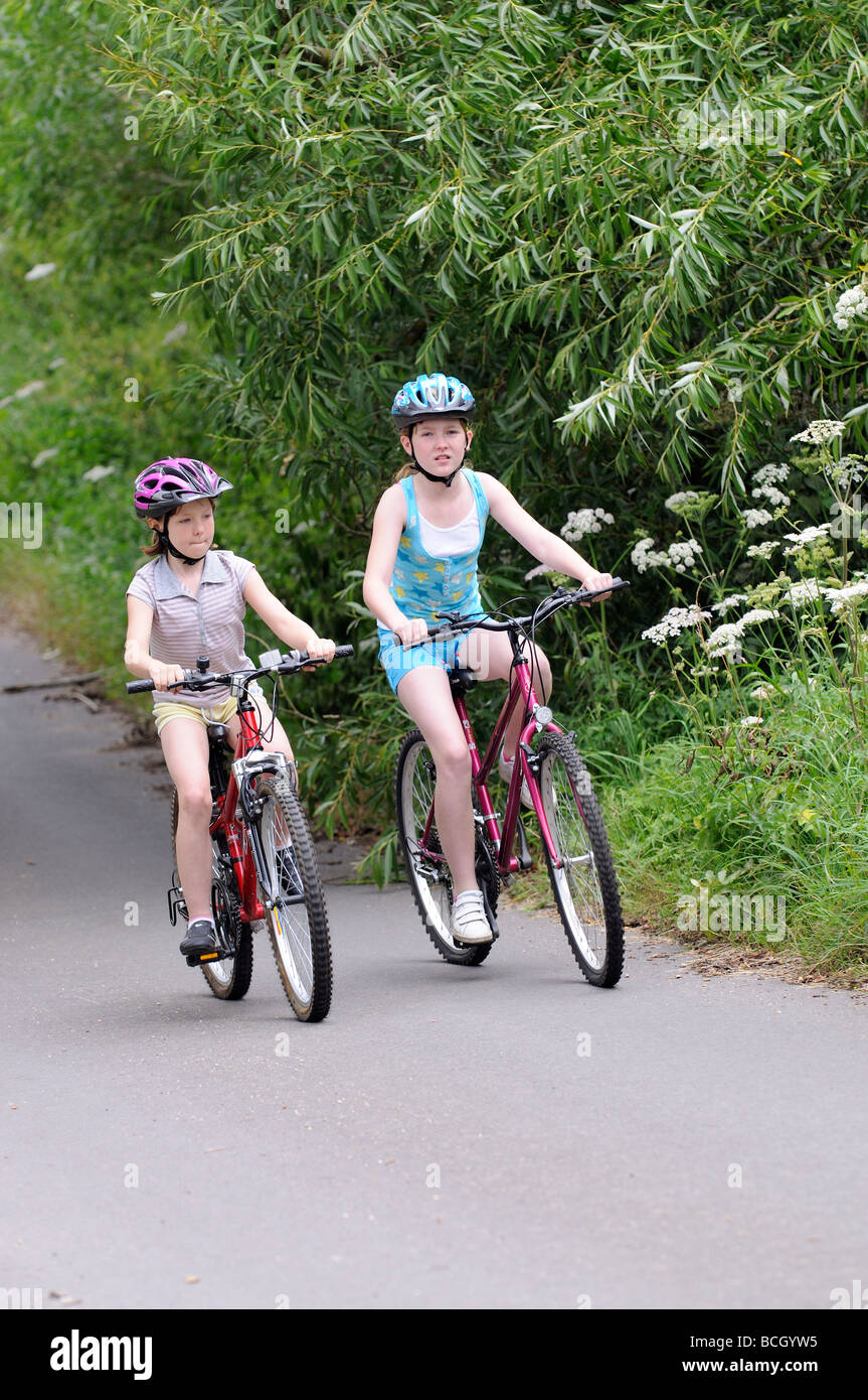 Children cycling along a country lane England UK Stock Photo - Alamy