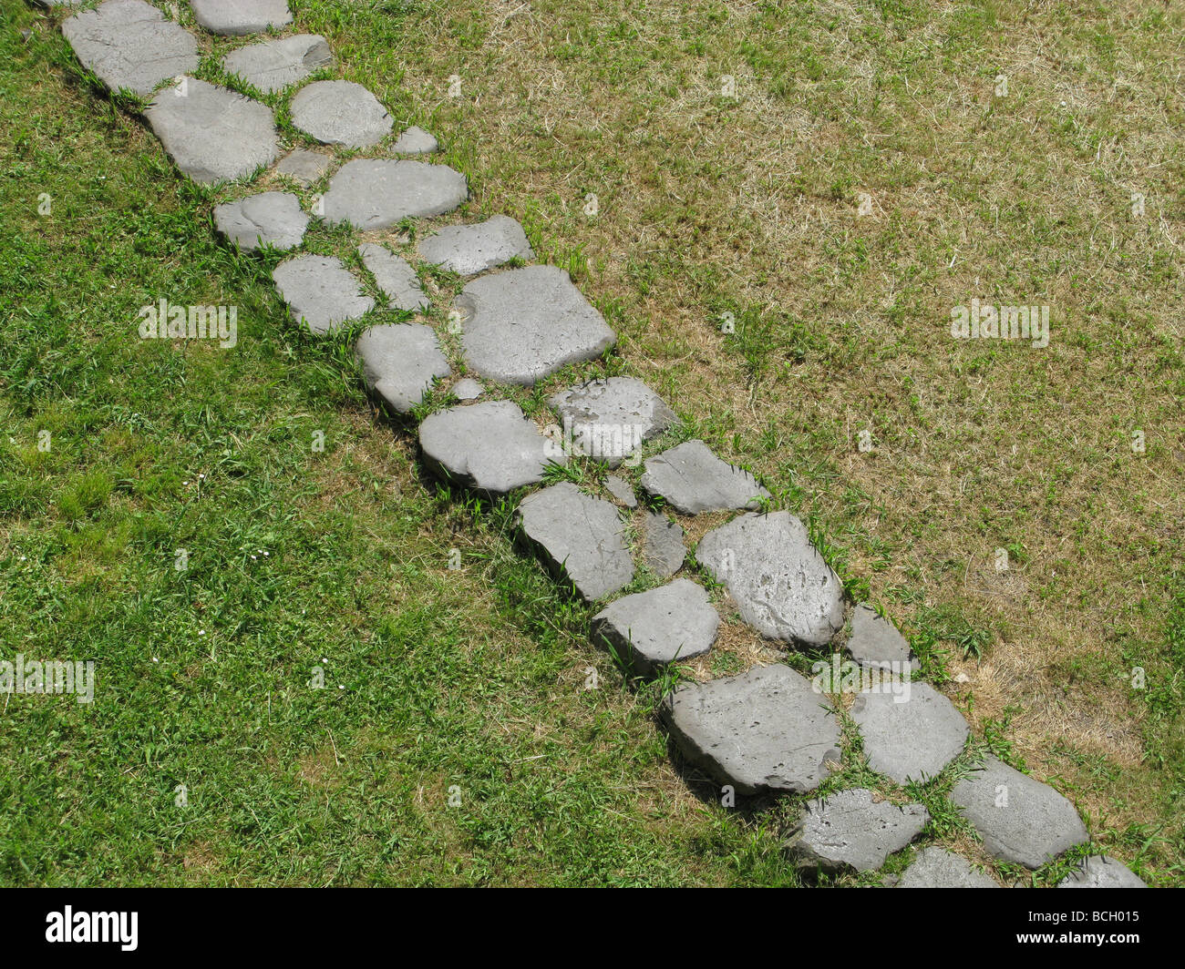 empty rural path made with stone slabs Stock Photo - Alamy