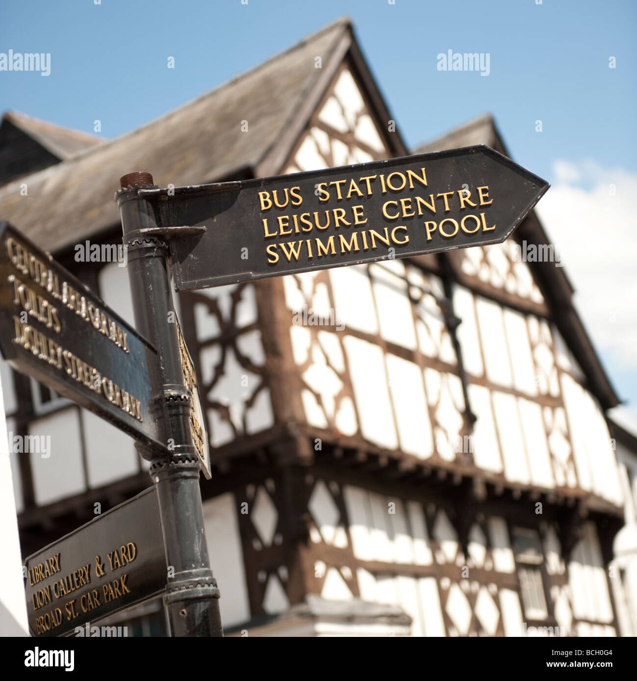 Tourist information signs in front of half timbered building in the ...
