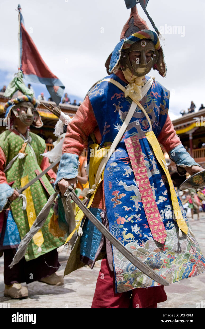 Buddhist monks dancing with traditional costumes. Hemis Gompa festival ...
