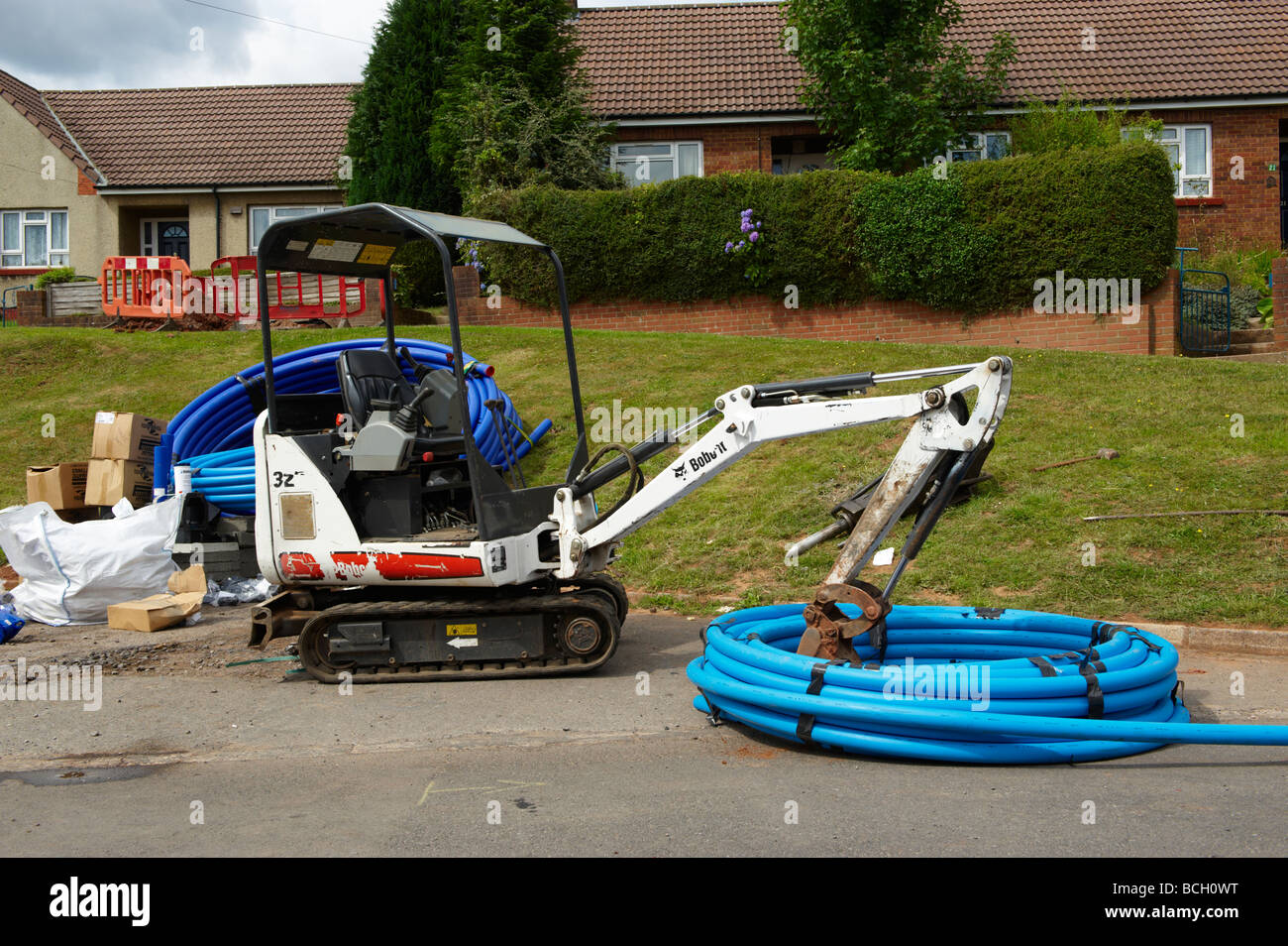 Water / Road maintenance works Stock Photo - Alamy