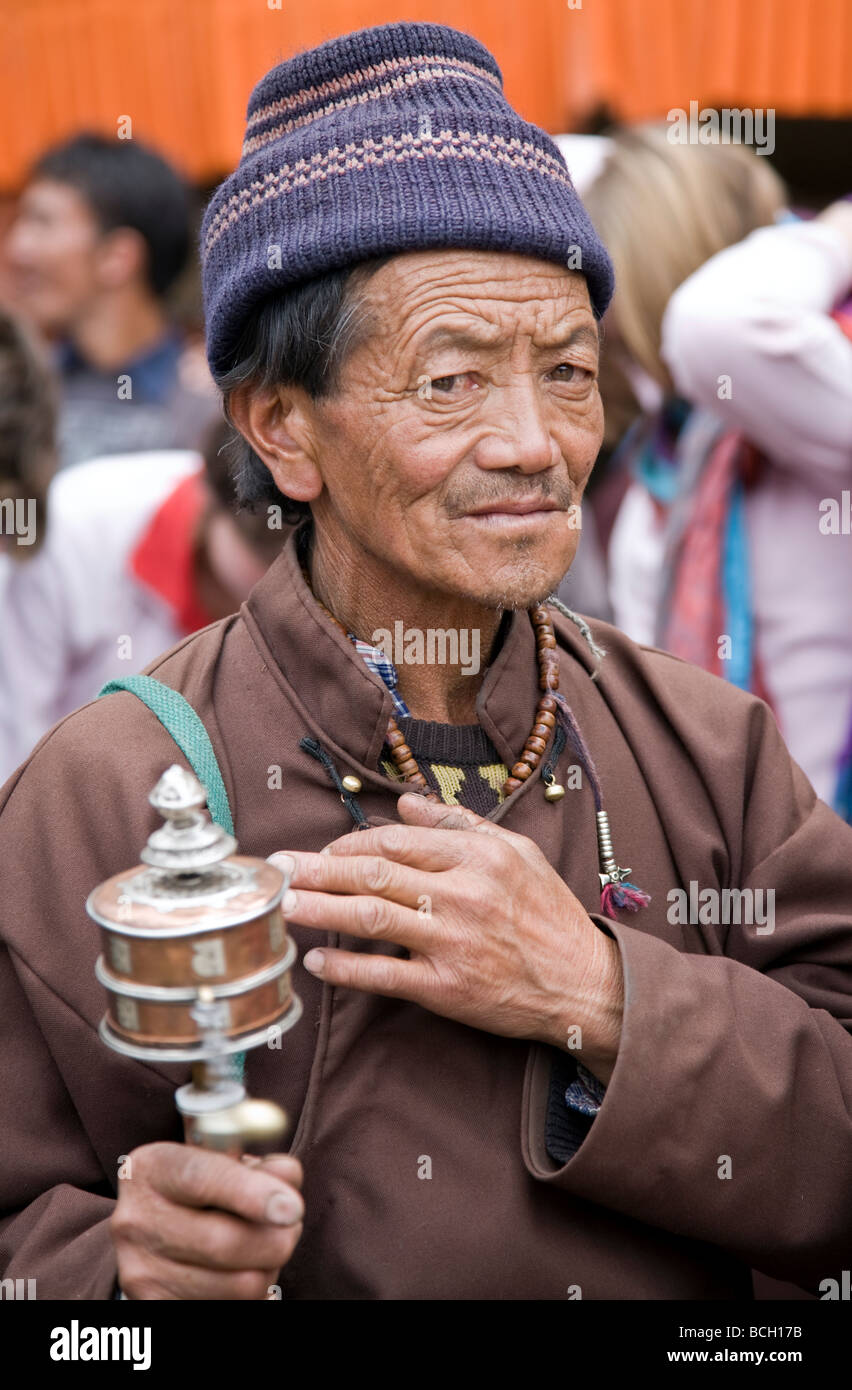 Ladakhi man spining a prayer wheel. Leh. Ladakh India Stock Photo - Alamy