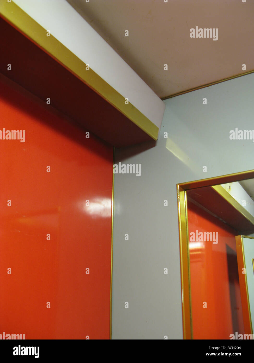 inside colourful red elevator Stock Photo - Alamy