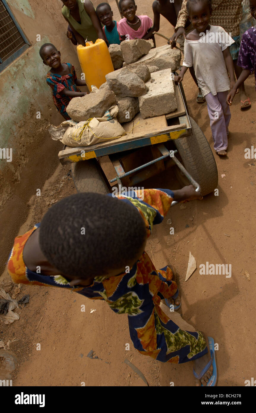 Child pulling cart hi-res stock photography and images - Alamy