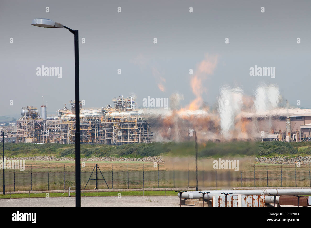 Flaring off gas at a gas processing plant at Rampside near Barrow in ...