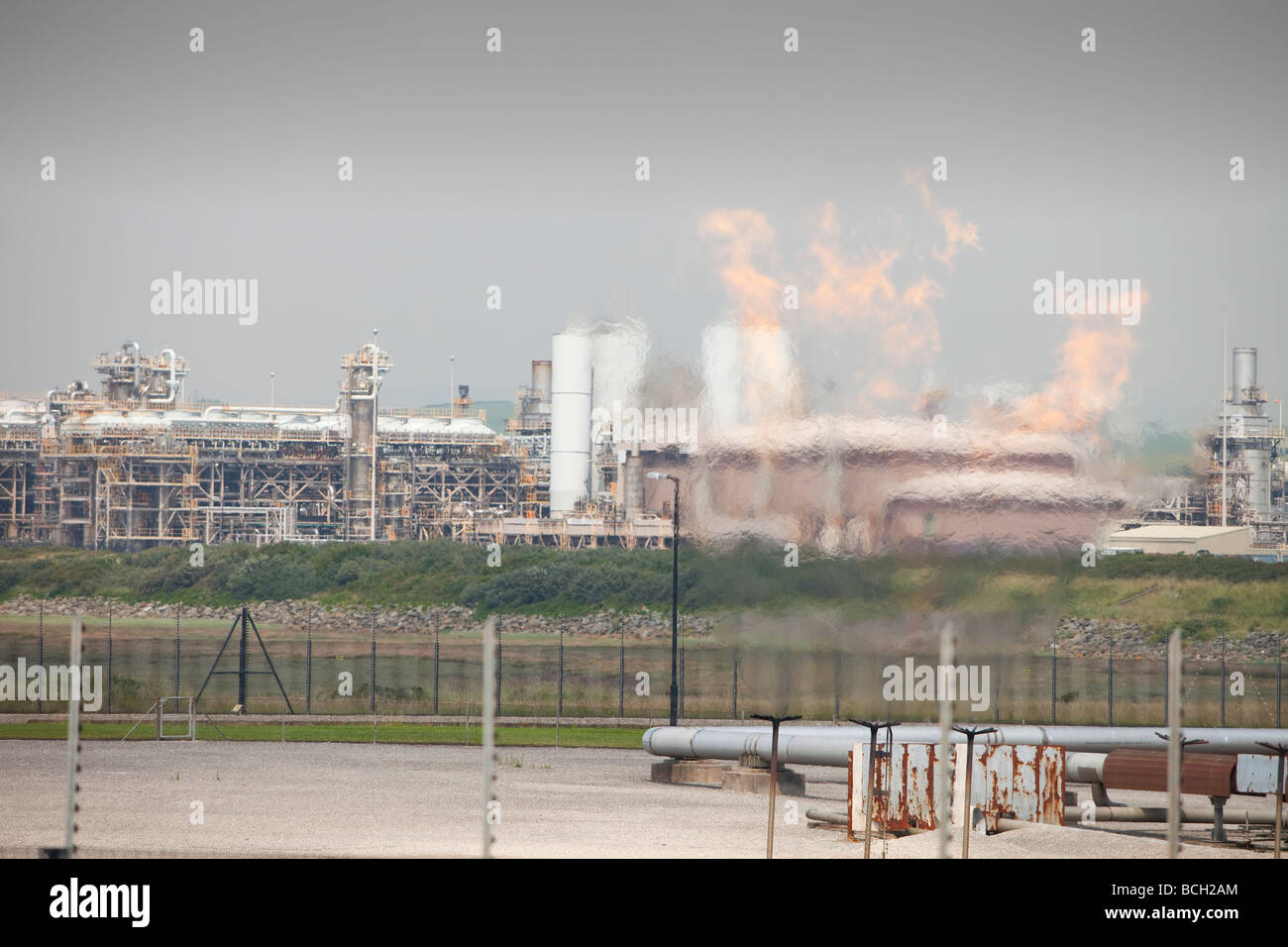 Flaring off gas at a gas processing plant at Rampside near Barrow in ...