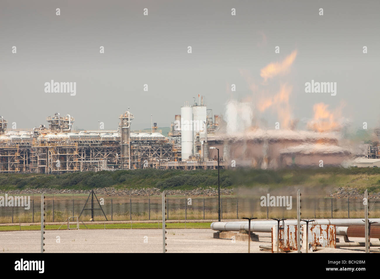 Flaring off gas at a gas processing plant at Rampside near Barrow in ...