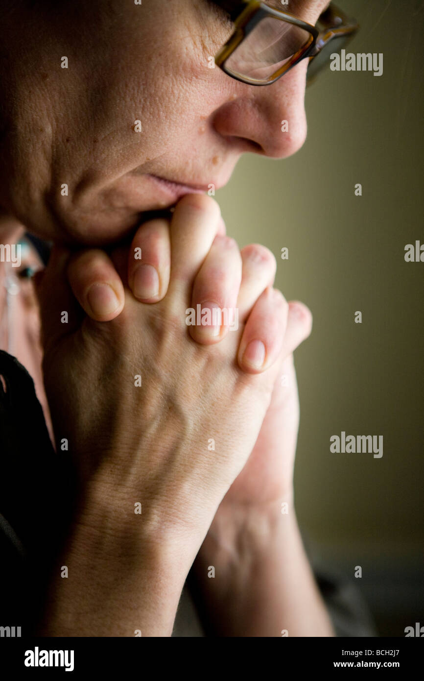 Woman worrying, looking anxious Stock Photo - Alamy