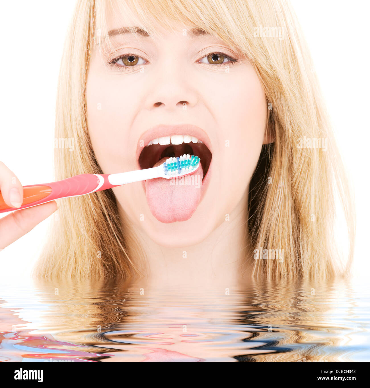 picture of happy girl with toothbrush in water Stock Photo - Alamy