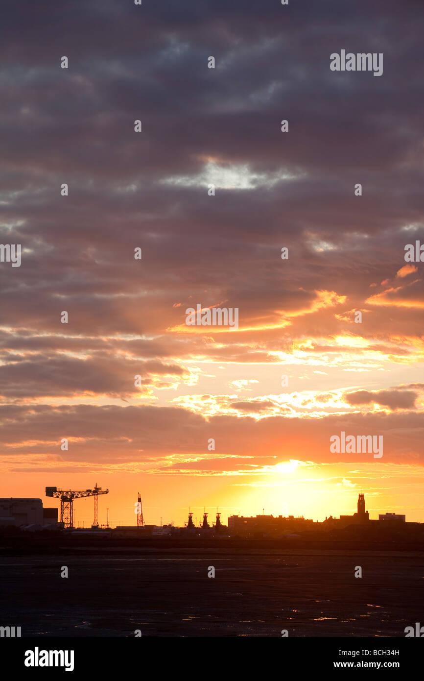 Sunset over Barrow in Furness town and shipyard Cumbria UK Stock Photo ...