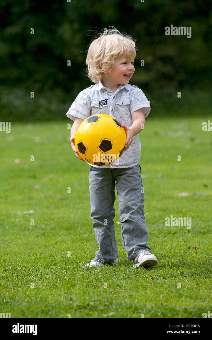 Little boy with a ball Stock Photo - Alamy