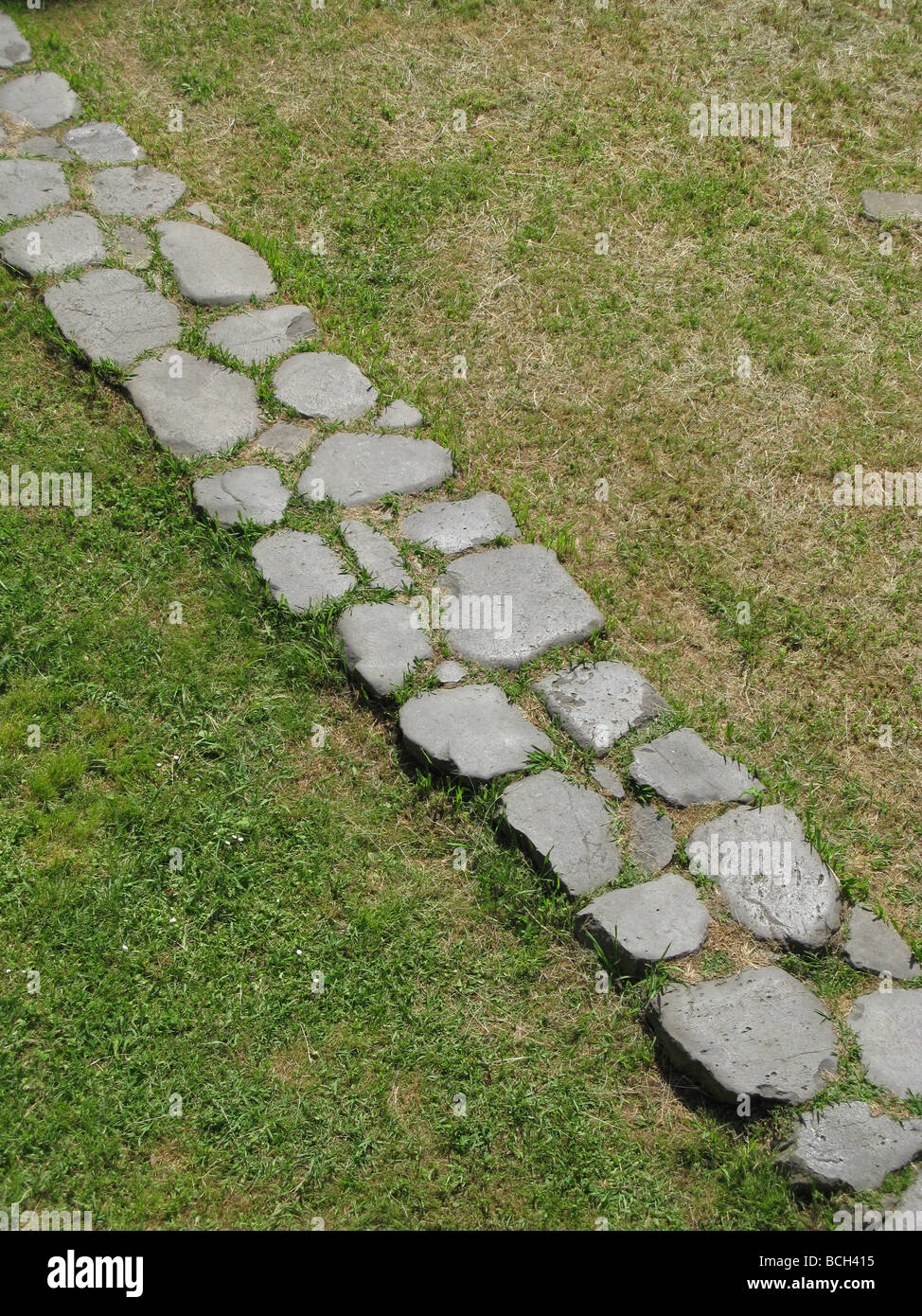 empty rural path made with stone slabs Stock Photo - Alamy
