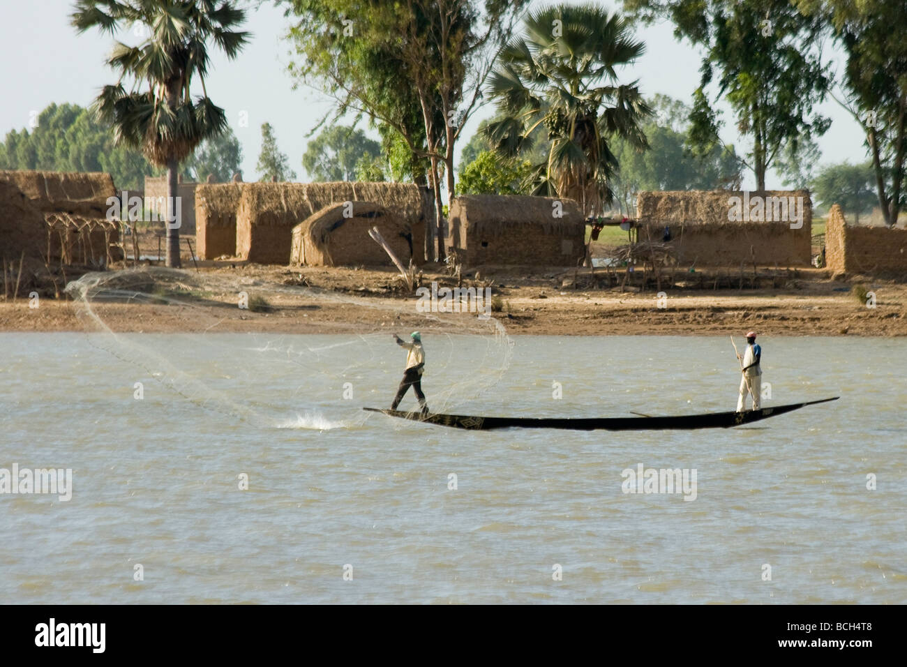 Fisherman throwing fishing net west hi-res stock photography and images ...
