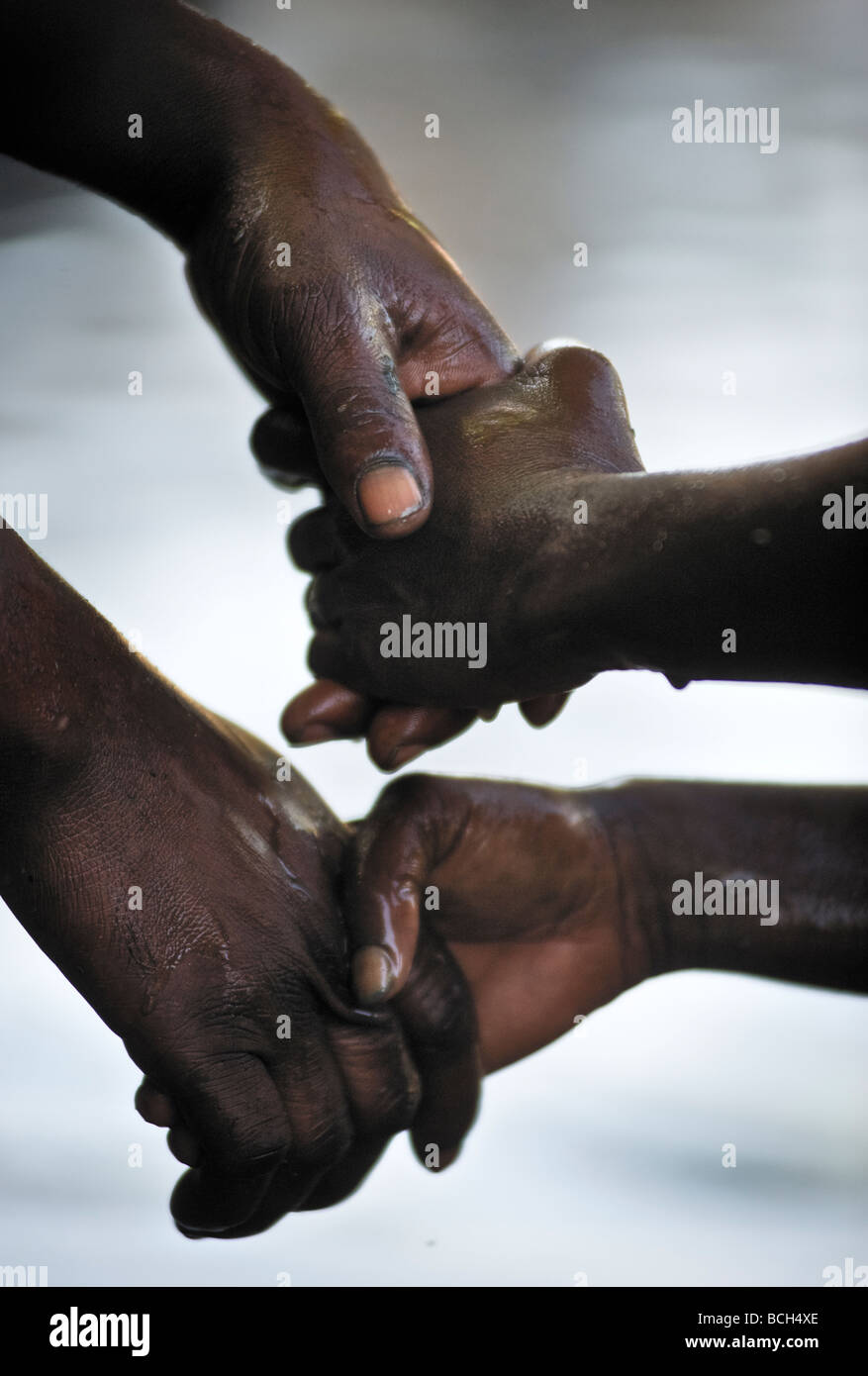 A manbo, or voodou priestess, prepares initiates a newcomer during the ...