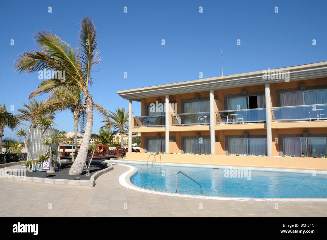 Luxury hotel with swimming pool in a summer resort Stock Photo - Alamy