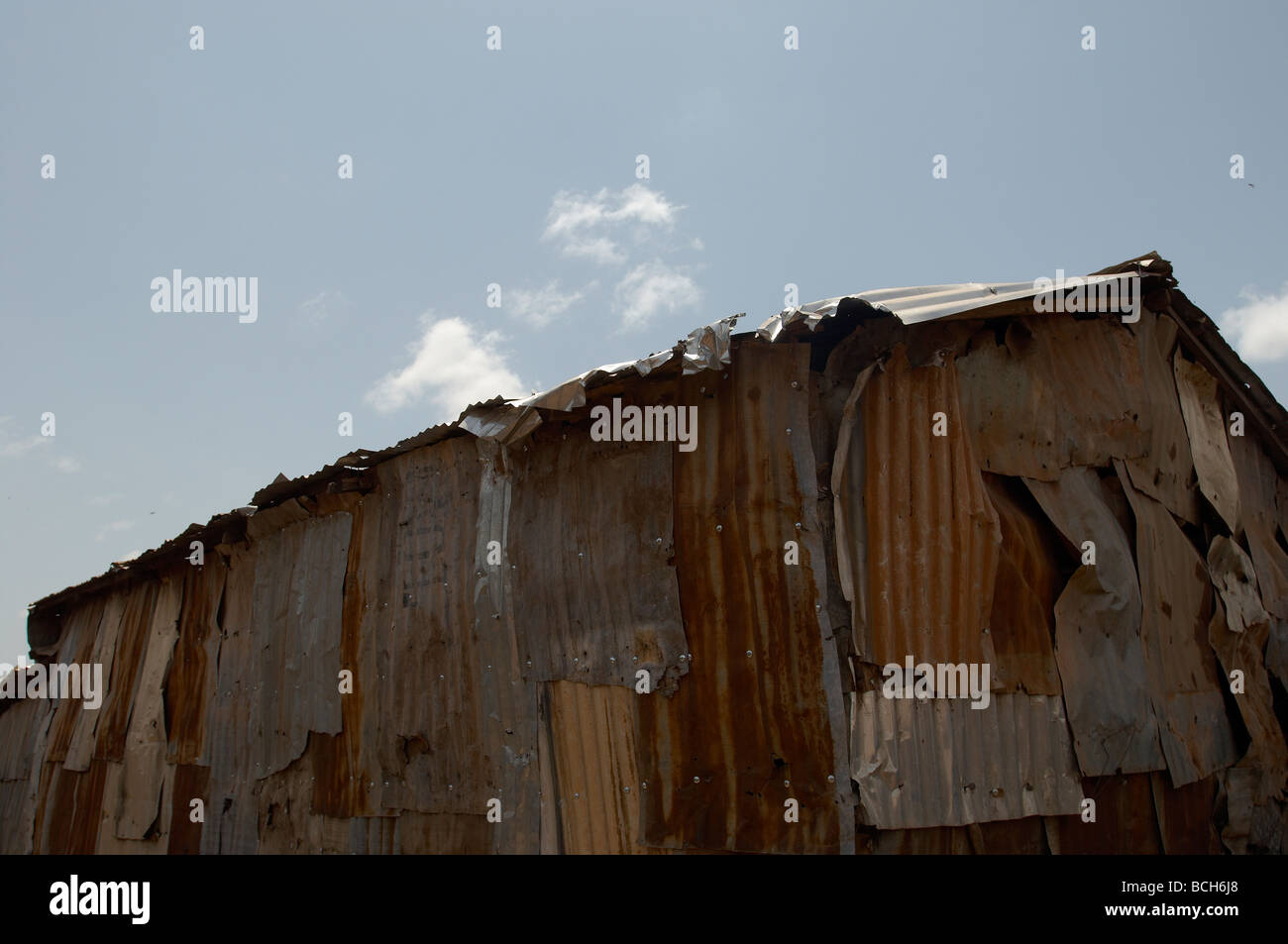 Corrugated iron shack in market in Tamale Ghana Stock Photo - Alamy