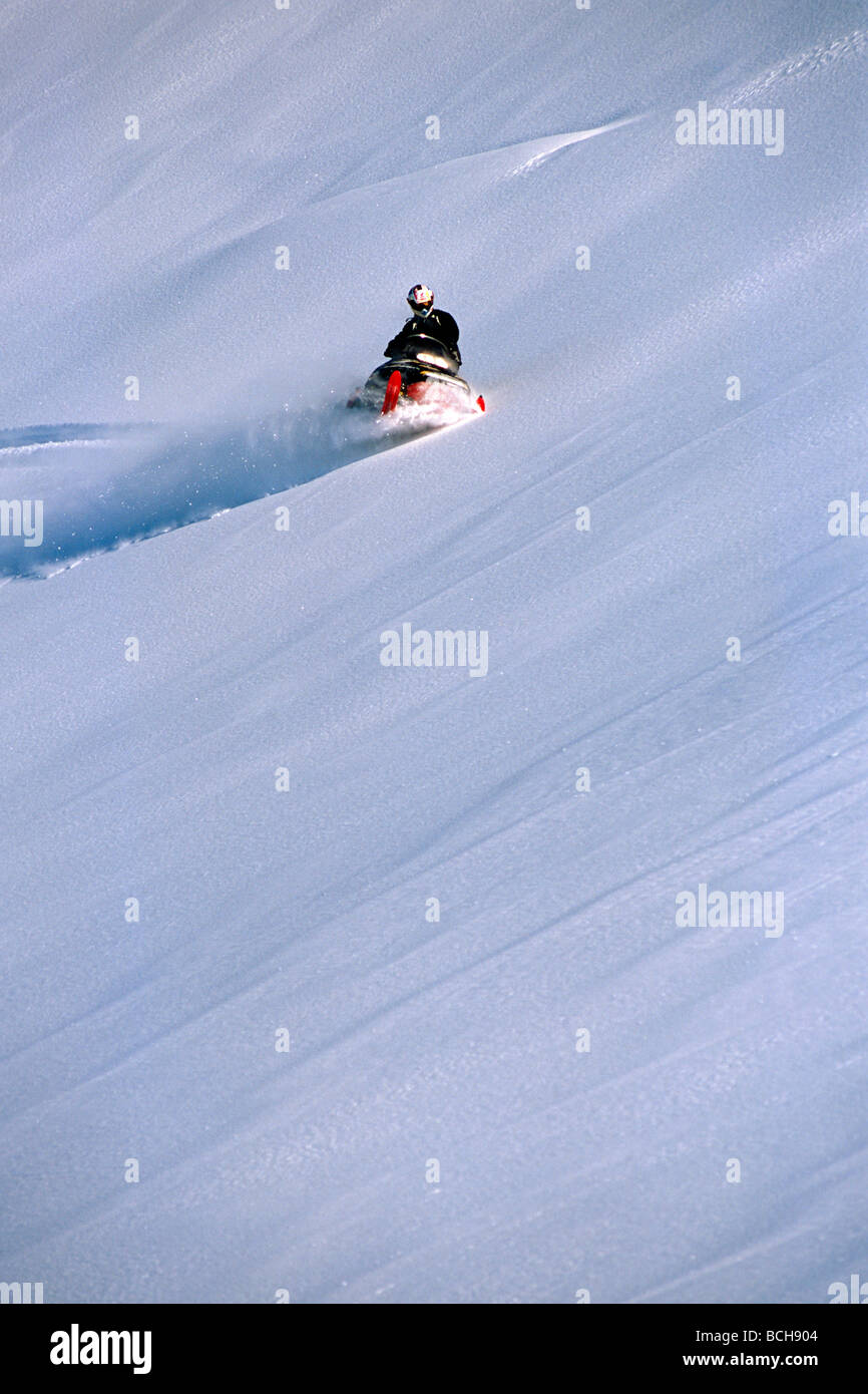 Man Snowmobiling Near Valdez Chugach Mts. SC Alaska Stock Photo - Alamy