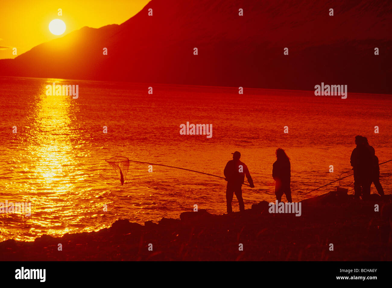 Man Hooligan Fishing Sunset Turnagain Arm SC Alaska Stock Photo - Alamy